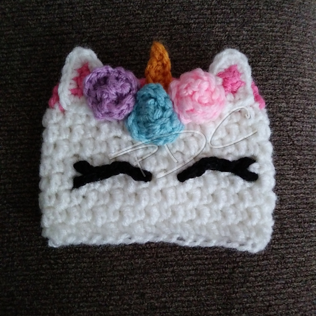 Ravelry: Unicorn Cup Cozy pattern by Charity Fausnaught