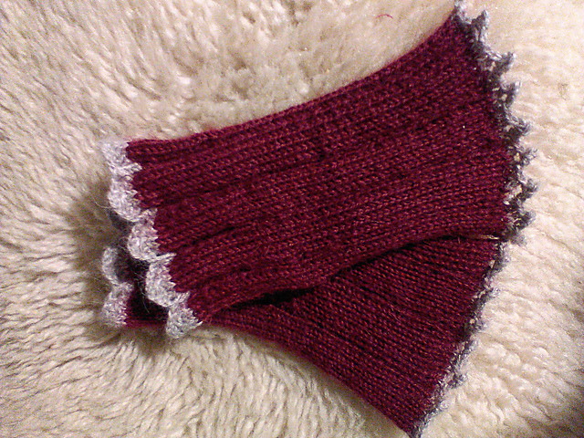 Ravelry: Titan Village Fingerless Mitts pattern by Geanie Ollman