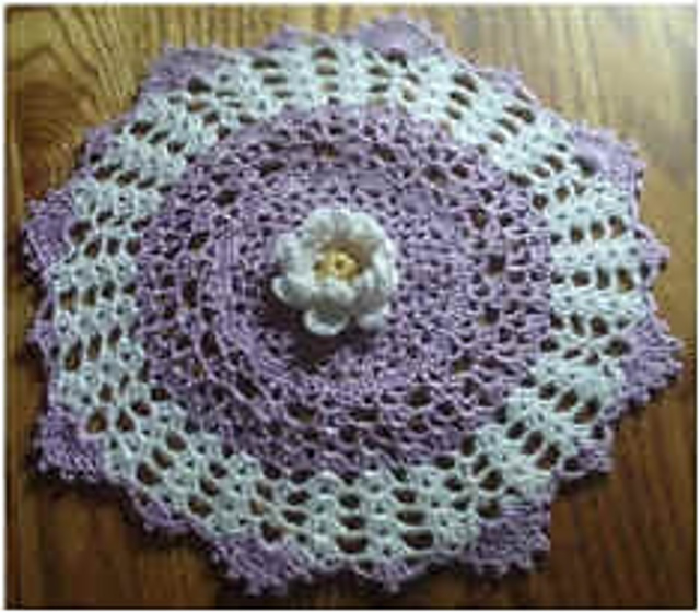 Ravelry: Crowned Daisy Doily pattern by Gemma R Owen