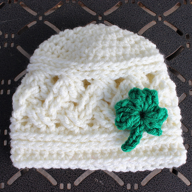 Ravelry: Celtic Weave Baby Hat pattern by Liz Meehan