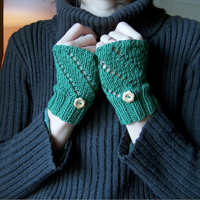 Ravelry: Diagonal Eyelet Hand Warmers pattern by creativeyarn