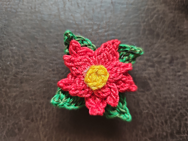 Ravelry: Poinsettia Sneaker Charm pattern by Sharon E. Santorum