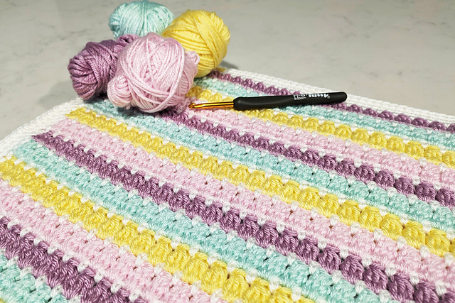 Ravelry: Easy Clusters Baby Blanket pattern by Susan Lowman