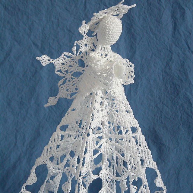 Ravelry: Snowflake Angel Tree Topper pattern by Kathryn A. Clark