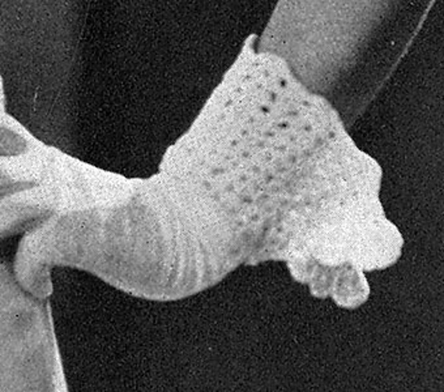 Ravelry: Shell Fan Gauntlet Cuff #61 pattern by The Spool Cotton Company