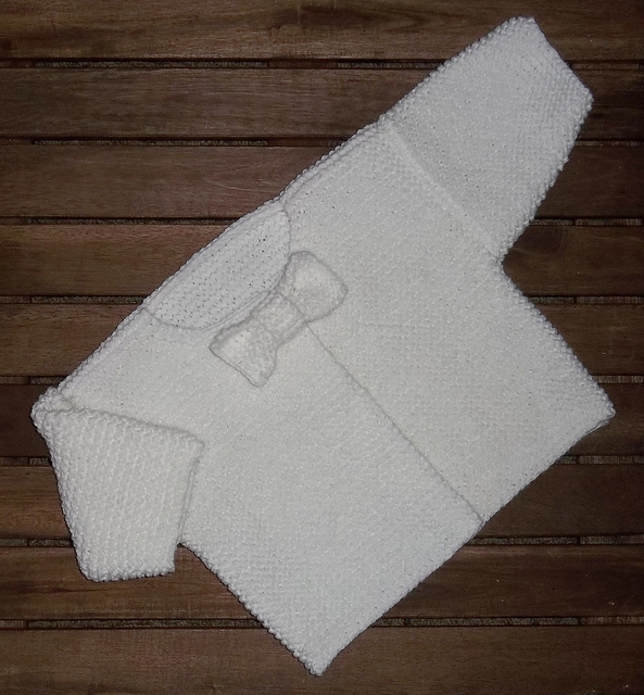 Ravelry: Baby Button and Bow Cardigan pattern by Audrey Wilson