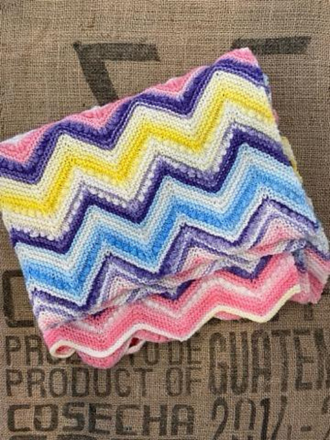 Ravelry: Ripple Effect Baby Afghan (knit) pattern by Lion Brand Yarn