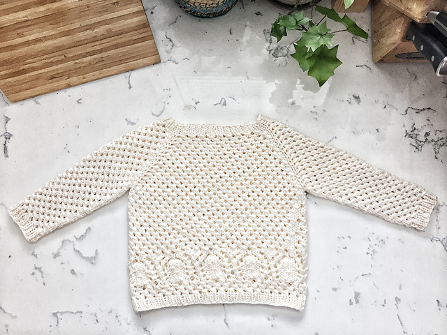 Ravelry: Baby Sand Dollar Sweater pattern by Nicky Jensen