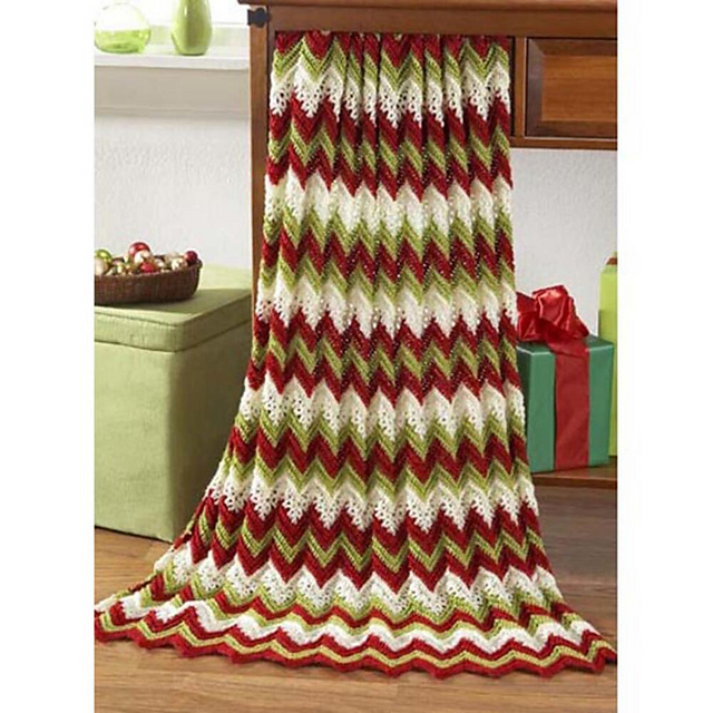Ravelry: Yuletide Lacy Ripple Afghan pattern by Herrschners