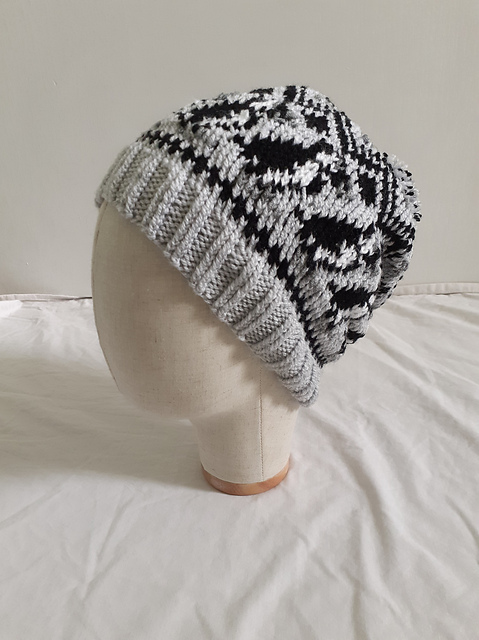 Ravelry: Grey Puffin Beanie Hat pattern by Em Witcutt