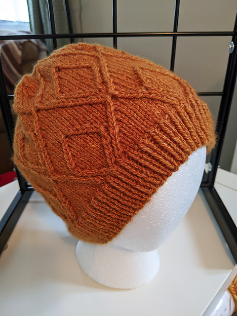 Ravelry: Nestled Diamonds Hat pattern by Debbie Trainor