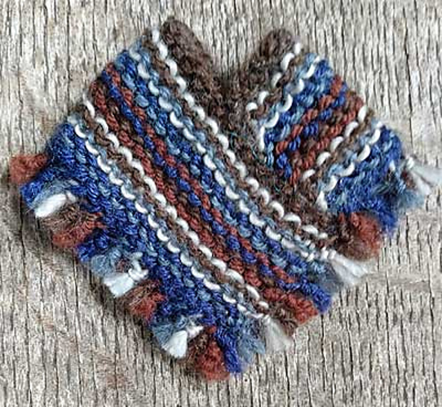 Ravelry: fjorlief's Garter Stitch Poncho for Tiny Rag Dolls