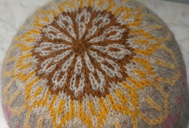Ravelry: Feather Cap Beanie pattern by Sue Beard