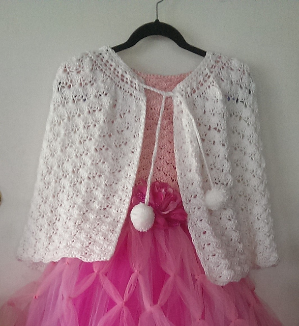Ravelry: Lacy Shell Caplet pattern by Donna Veatch