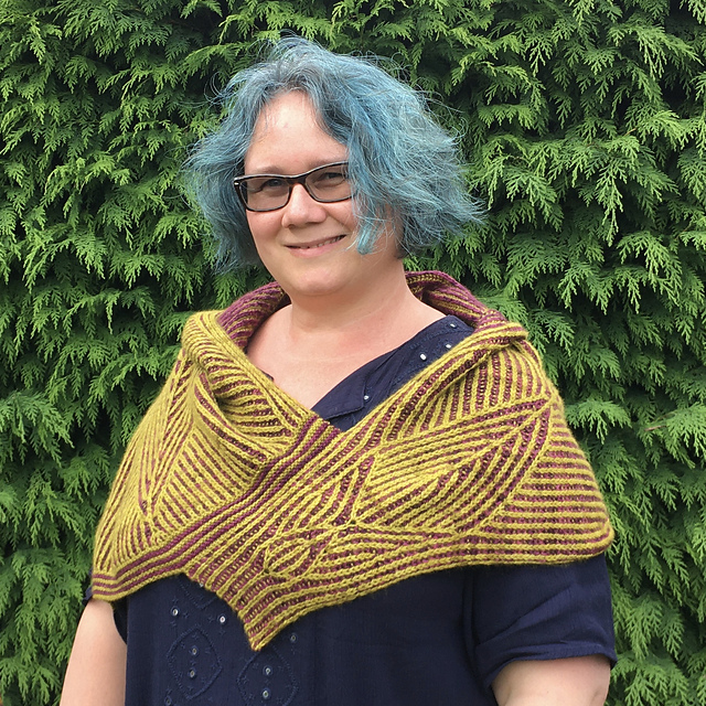 Ravelry: Marmee March Hooded Cowl pattern by Kath Andrews