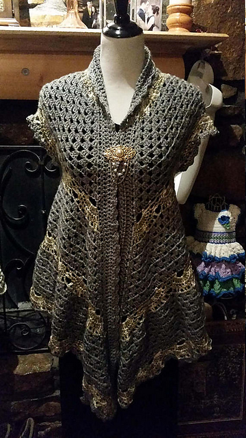 Ravelry: Peek-A-Boo Cardigan pattern by Paula Marie