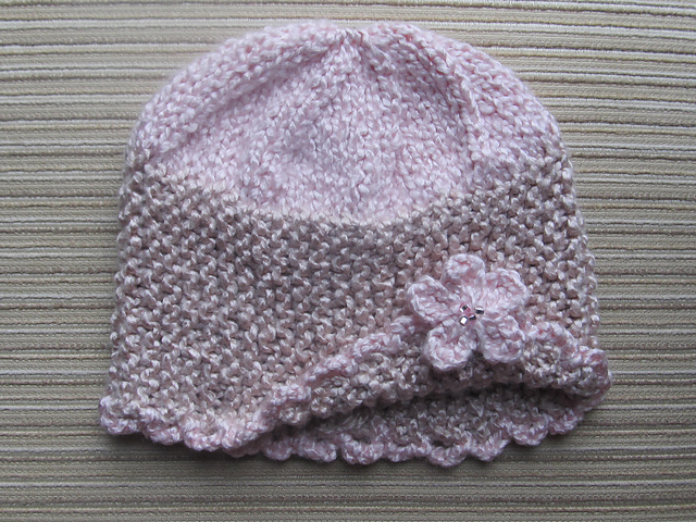 Ravelry: Spring Hat with a Flower pattern by Yelena Chen