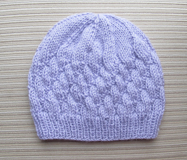 Ravelry: Hat with Faux Diagonal Cables pattern by Yelena Chen