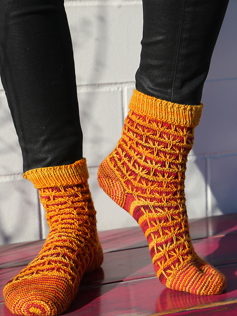 Ravelry: Light the Torches Socks pattern by Heather Storta