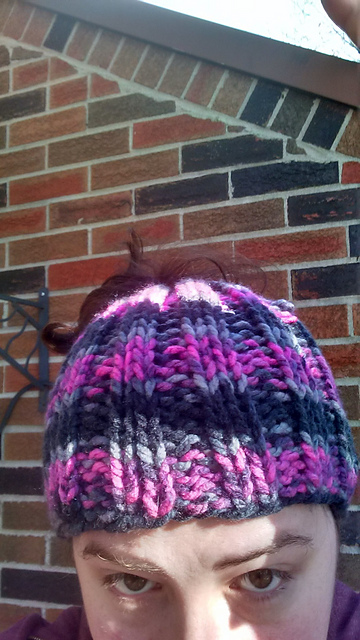 Ravelry: Ribbed Messy Bun Hat pattern by Heather Ellis