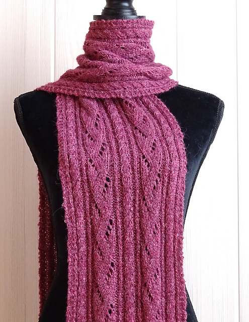 Ravelry: Adeline cables and lace scarf pattern by Alice Moreels
