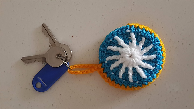 Ravelry: Sunny Key Ring Cosy pattern by Alessandra Poggiagliolmi
