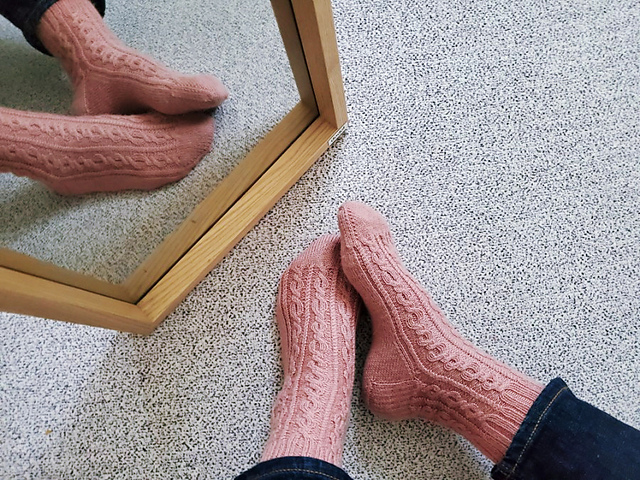 Ravelry: Rococo cable Socks pattern by Sangmi Lee