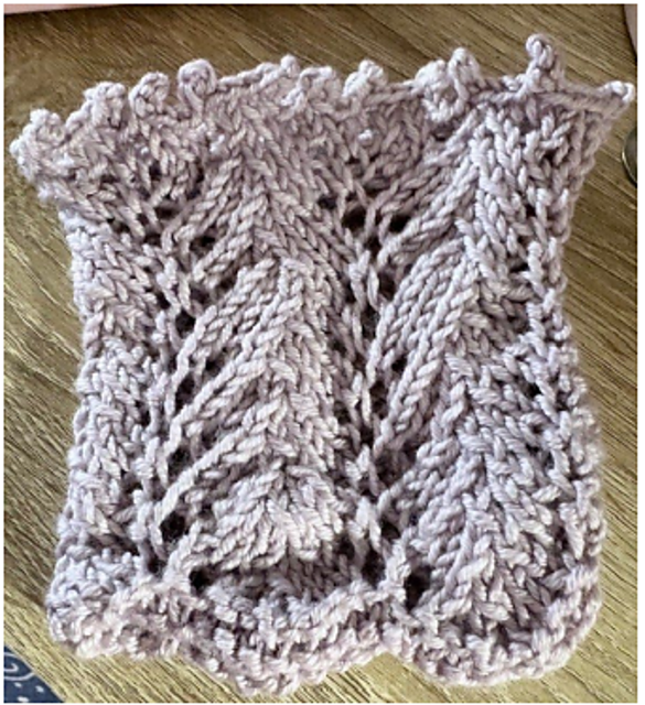 Ravelry: Entangled Knit Lace Reticule pattern by Rebecca A. Conner