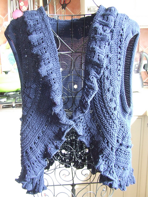 Ravelry: Lacy Frilled Jacket pattern by Sirdar