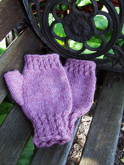 Ravelry: A Little Twist Fingerless Mitts pattern by Jen Martin