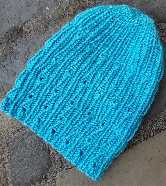 Ravelry: Dropped Lines Hat pattern by Jennifer Knight