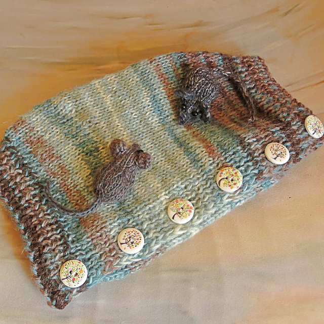 Ravelry: Comfy Cat Cardigan pattern by Joan Rowe