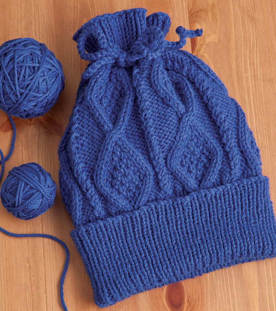 Ravelry: Cabled Paperbag Hat pattern by Victoria Wickham