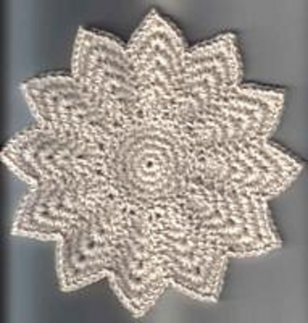 Ravelry: 12-Point Round Dishcloth pattern by Amelia Beebe