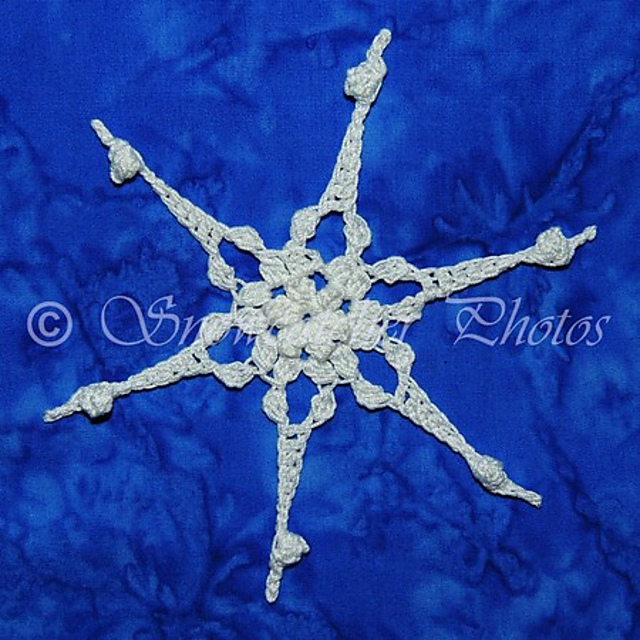 Ravelry: Extra Popcorn Snowflake pattern by Deborah Atkinson
