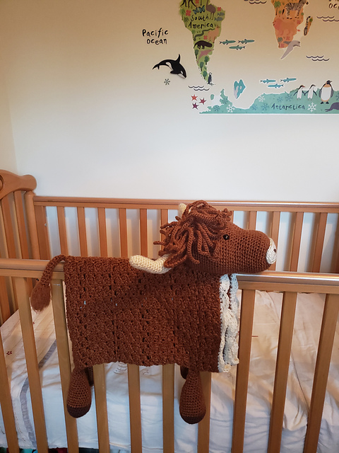 Ravelry: Highland Cow Cot Blanket pattern by Kate Kinnear