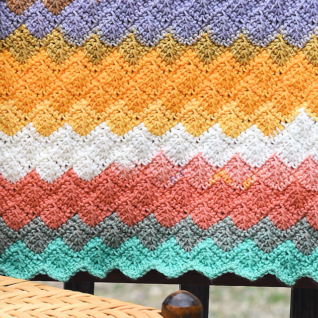 Ravelry: Dragon Scales Baby Blanket pattern by Kim Guzman