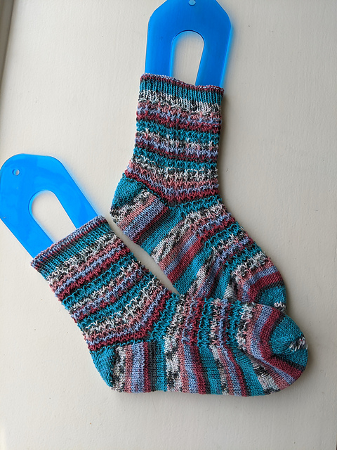 Ravelry: Broken Ladder Socks pattern by Lauren Savidge