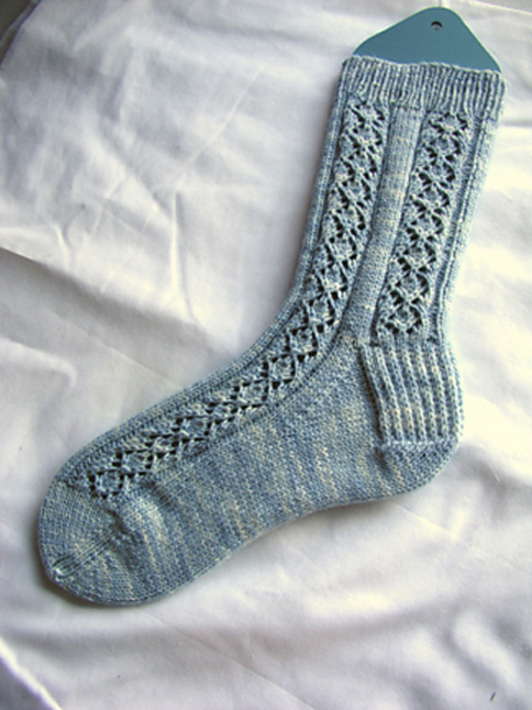 Ravelry: King Charles Lacy Brocade Socks pattern by Allison Sarnoff