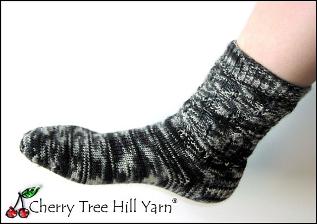 Ravelry: Black Tie Sock pattern by Judy Sumner