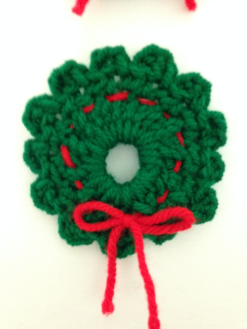 Ravelry: Wreath Lapel Pin pattern by Susan Heyn