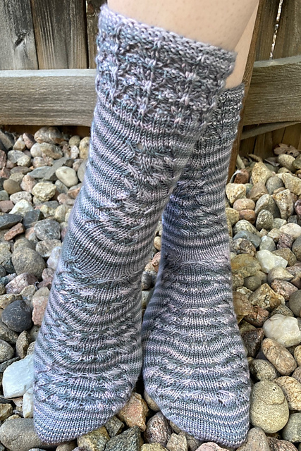 Ravelry: Hope Feathers Socks pattern by Laura Fahlin