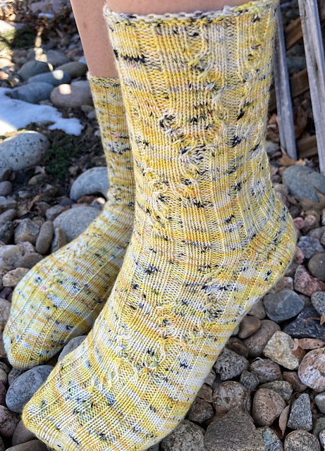 Ravelry: Apollo Sun Socks pattern by Laura Fahlin