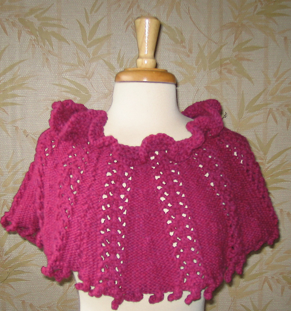 Ravelry: Freda Mini Poncho pattern by Amanda Crawford