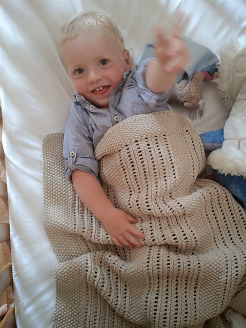 Ravelry: Moss and Lace Rib Baby Blanket pattern by Lucy Turner