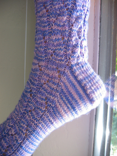 Ravelry: Lacy Mock Cable Socks pattern by Lucia Tedesco