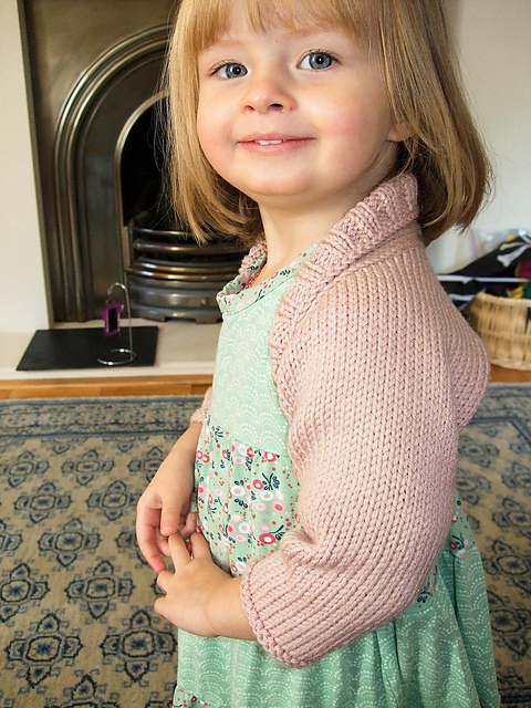 Ravelry: Party Shrug (Child) pattern by Debbie Bliss