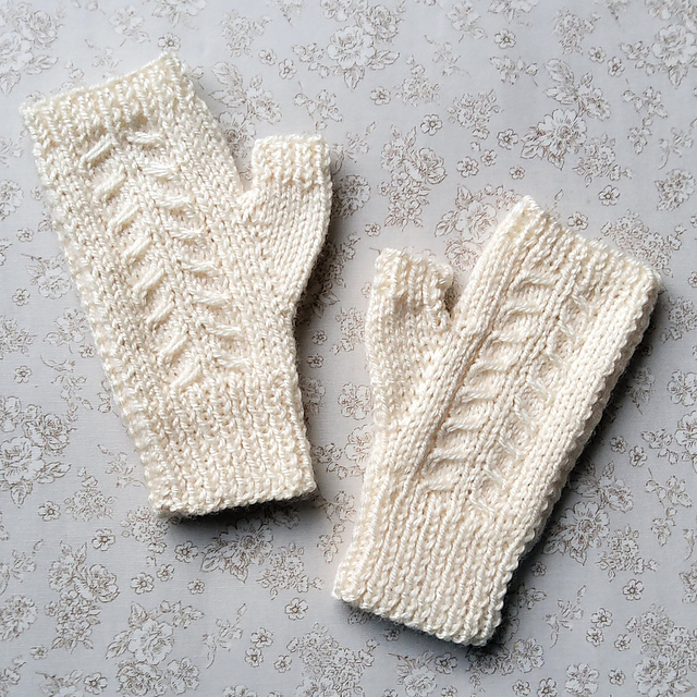 Ravelry: Cabled Fingerless Mittens with Thumbs pattern by marianna mel