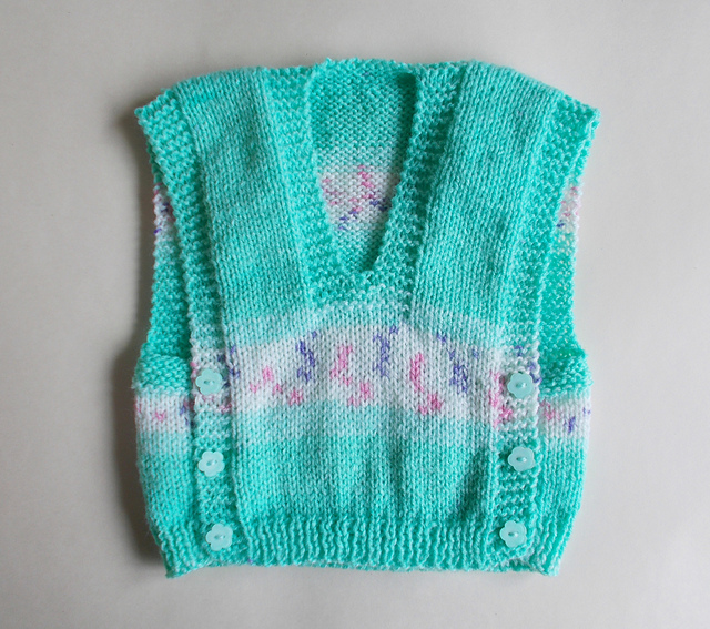 Ravelry: Melika self-patterning yarn baby vest top pattern by marianna mel
