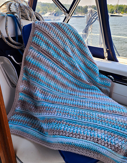 Ravelry: Feather Stitch Baby Blanket pattern by Merri Purdy